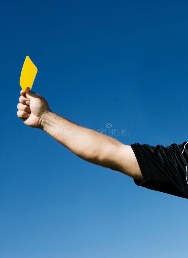 Soccer Referee Holding Yellow Card Stock Image - Image of punish, hold ...