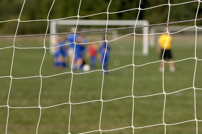 Children playing soccer stock image. Image of save, outside - 743371