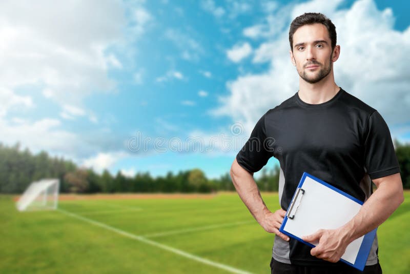 Soccer Trainer on a Soccer Field Stock Image - Image of lifestyle ...