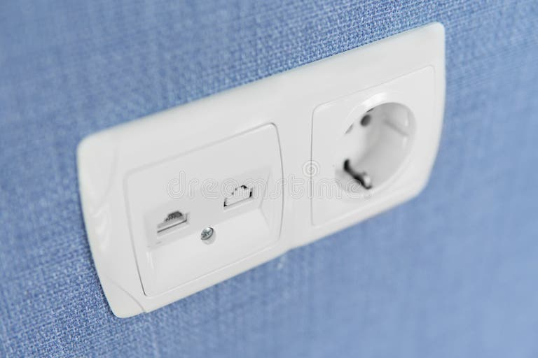 Socket on a Blue Wall, a Multifunction Outlet with an Internet ...