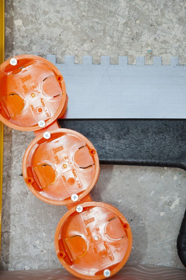 Socket Box with Spatula on Damaged Wall Background. Repair and ...