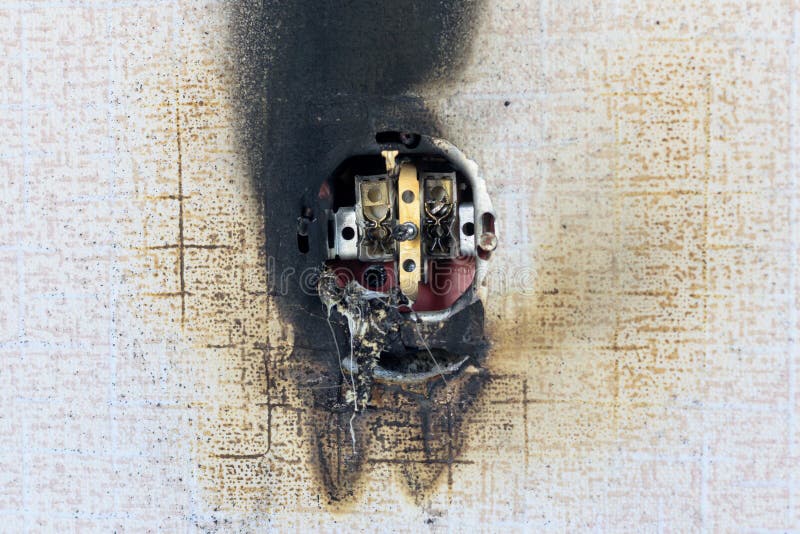 . Socket on Fire. he is Extinguished. Plastic Melted. Bare Wires Stock ...