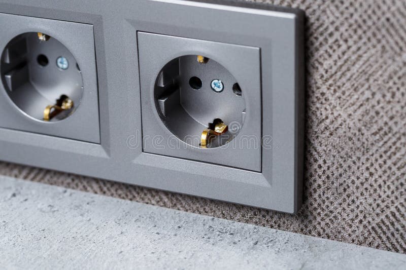 Socket Gray with Ground with an Input for Two Devices. she is on the ...