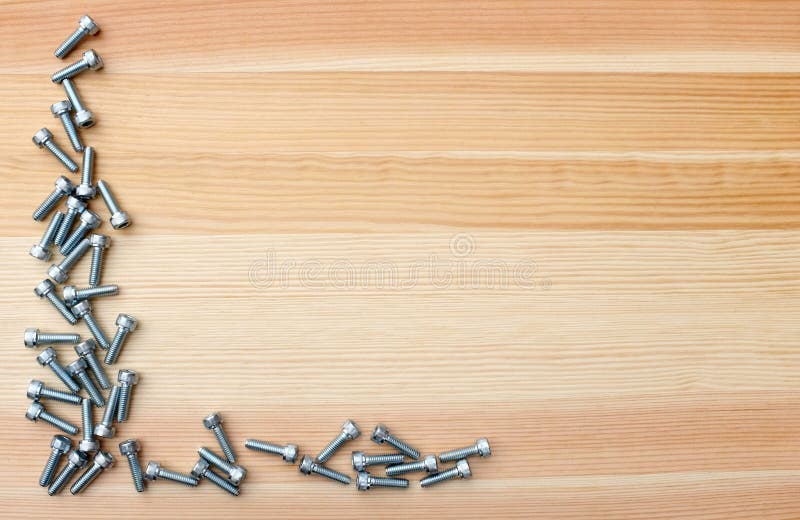 Socket Head Screws As L-shape Border on Woodgrain Background Stock ...
