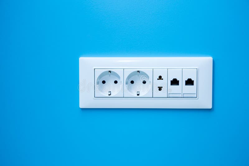 A Socket on a Light Blue Wall. Stock Photo - Image of equipment, light ...