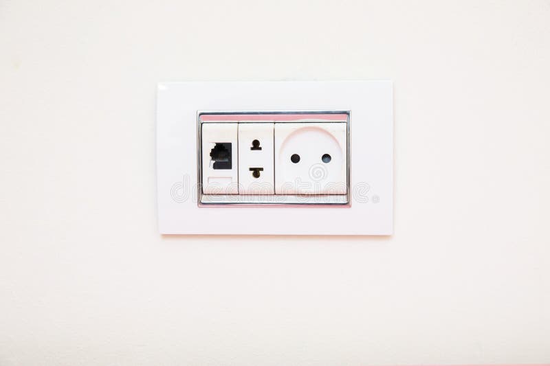 A Socket on a Light Gray Wall, a Multifunction Outlet with an Internet ...