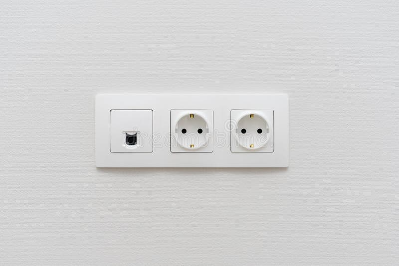 A Socket on a Light Wall, a Multifunction Outlet with an Internet ...