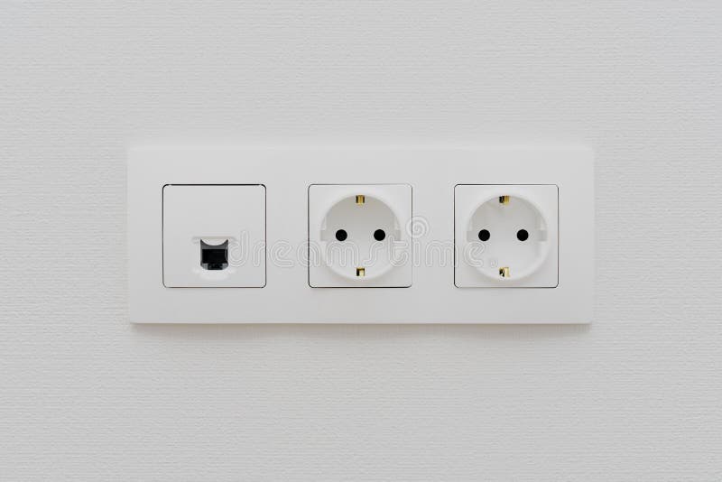 A Socket on a Light Wall, a Multifunction Outlet with an Internet ...