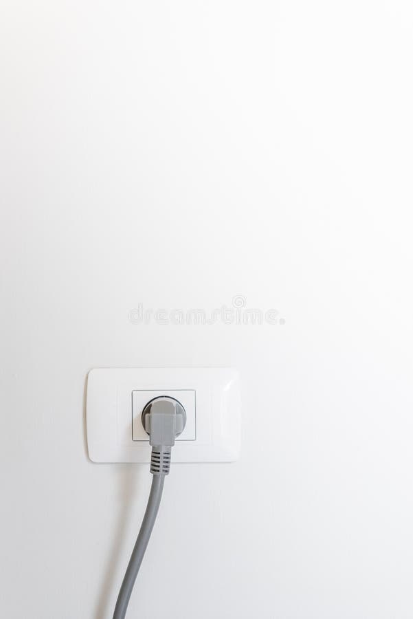 Socket Plug with Electric Plug Line on White Wall Stock Photo - Image ...