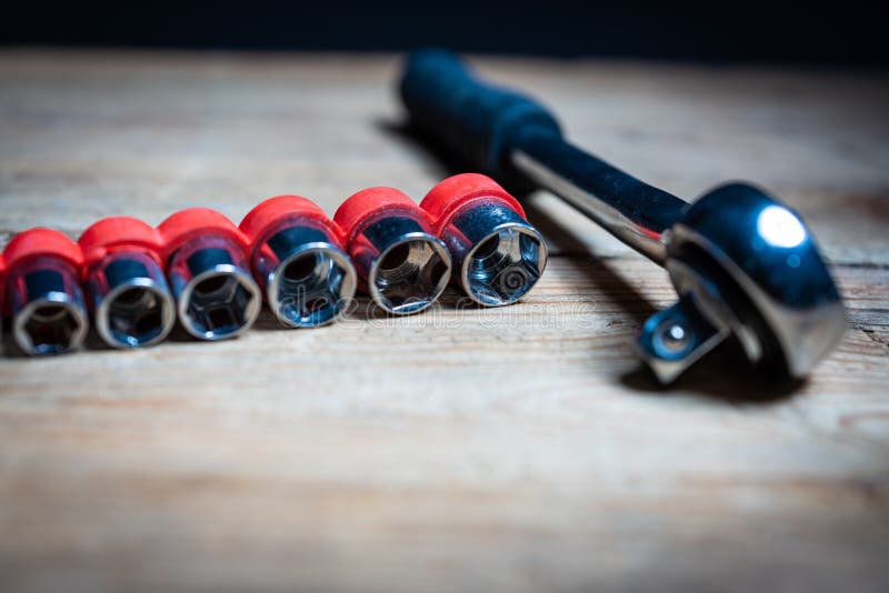 A Socket Wrench and Its Inserts on a Blue Tool Box Stock Image - Image ...