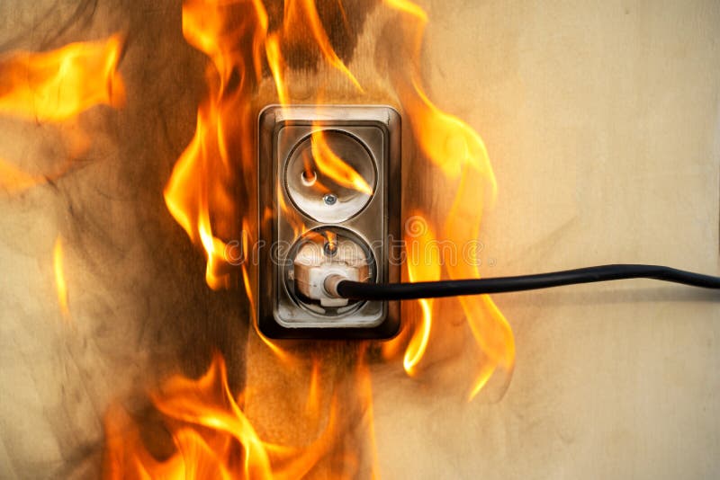 Socket and wire in fire. stock image. Image of burnt - 178708951