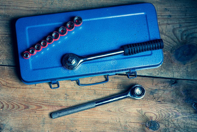 A Socket Wrench and Its Inserts on a Blue Tool Box Stock Image - Image ...