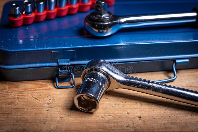 A Socket Wrench and Its Inserts on a Blue Tool Box Stock Image - Image ...