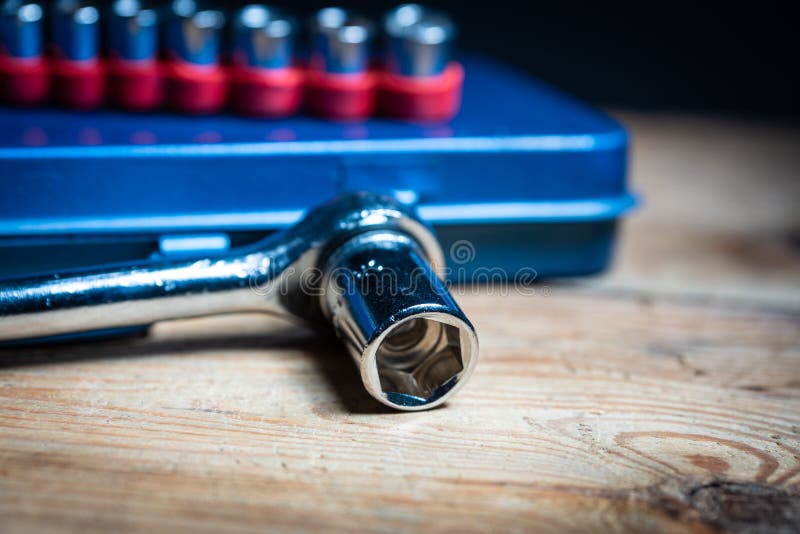 A Socket Wrench and Its Inserts on a Blue Tool Box Stock Image - Image ...