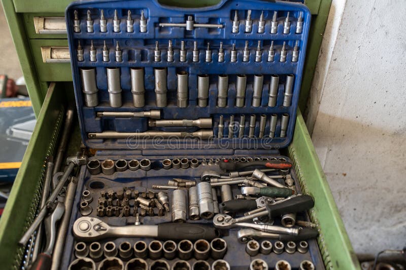 Socket Wrench Set with Various Bits and Tools in an Open Green Tool ...