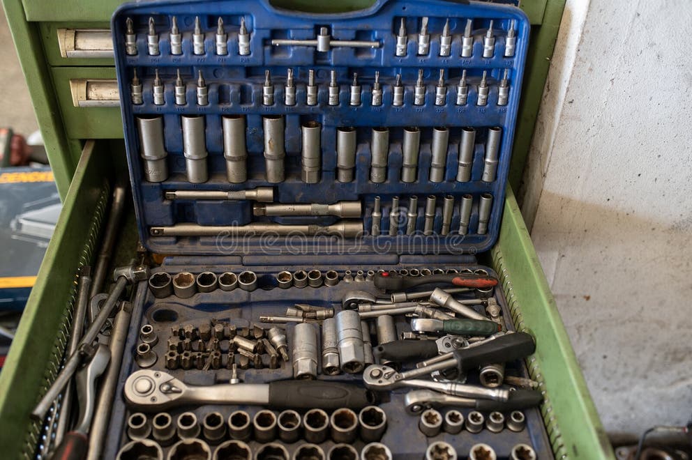 Socket Wrench Set with Various Bits and Tools in an Open Green Tool ...
