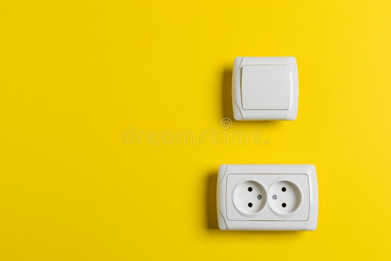 Socket on yellow wall stock image. Image of industry - 135081201
