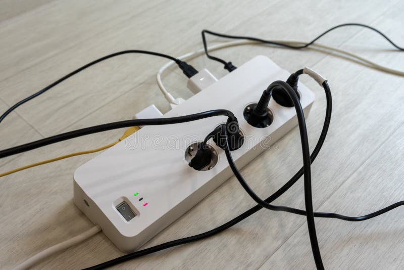 Sockets on Wire with Multiple Connected Electrical Appliances Stock ...
