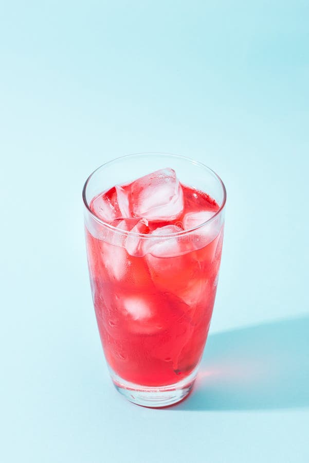 Soda. Red Sparkling Water with Ice in a Glass Stock Image - Image of ...