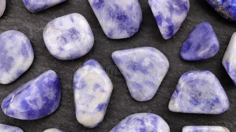 Sodalite Rare Jewel Stones Texture on Black Stone Background. Moving ...