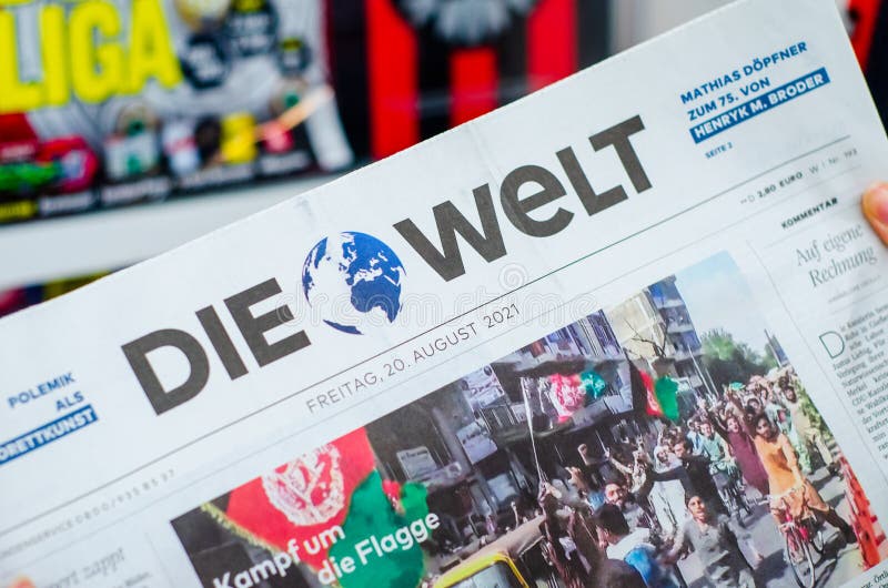 Soest, Germany - August 20, 2021: Hands Holding Die Welt Newspaper ...