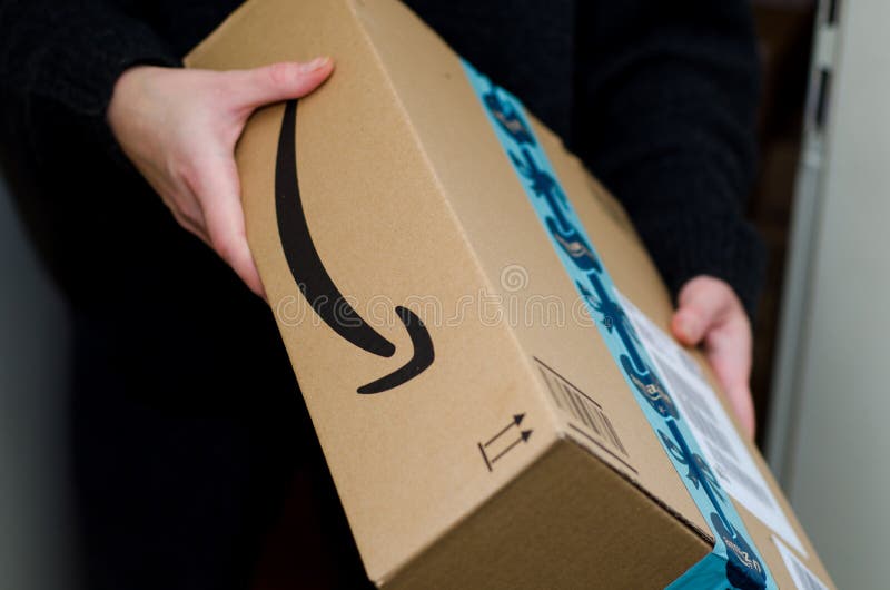 Woman receiving parcel editorial stock image. Image of female - 26884669