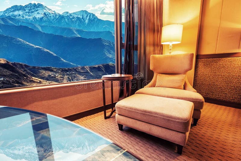 Sofa in Living Room in View of Snow Mountain Stock Image - Image of ...