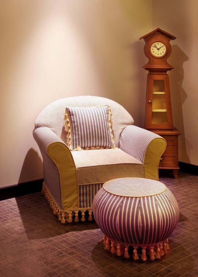 Sofa and standing watch stock photo. Image of interior - 13341034