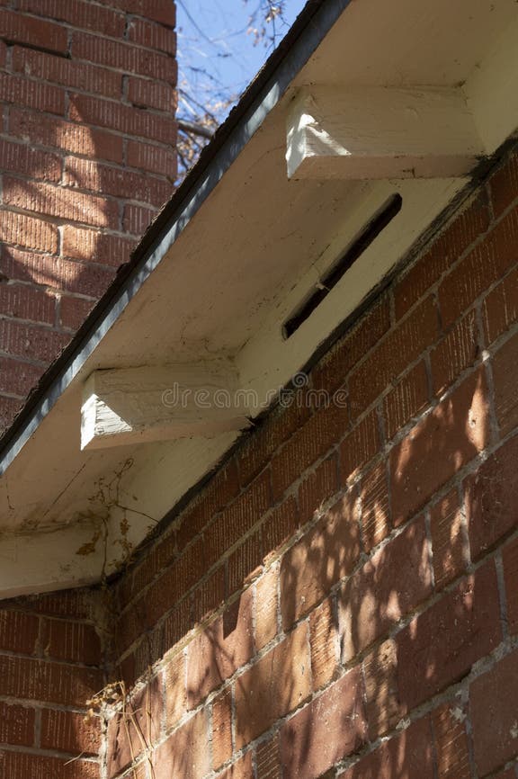 Soffit, Under Eave Attic Vent on a Brick House Stock Image - Image of ...