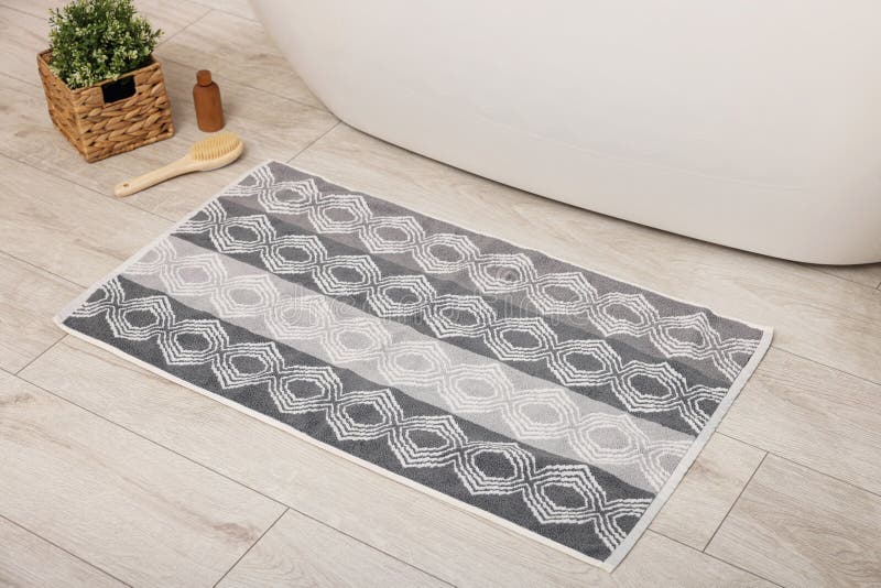 Soft Bath Mat with Pattern on Floor in Bathroom Stock Image - Image of ...