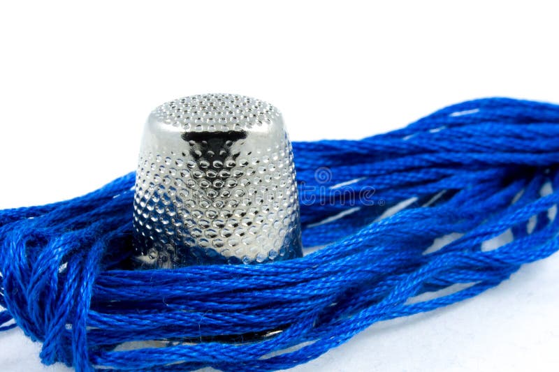 Soft Blue Cotton Thread and a Thimble Stock Photo - Image of fashion ...