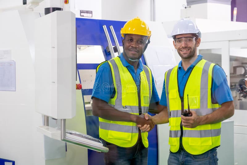 Two Factory Worker Men with Uniform Stay with Operating Machine and ...