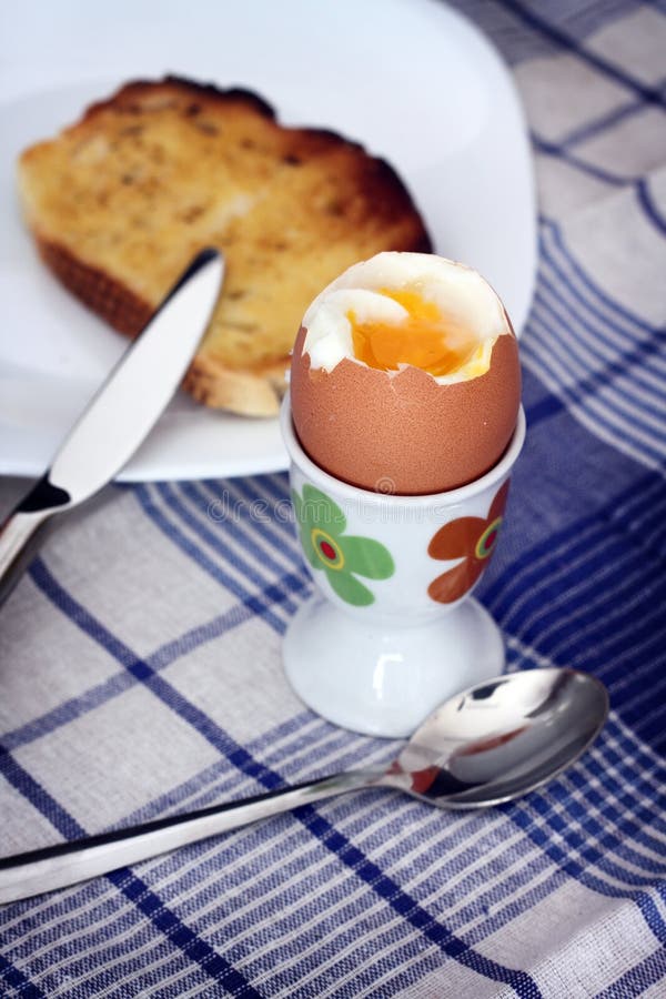 Boiled Fresh Smash Broken Egg for the Breakfast on the Porcelain Stand ...