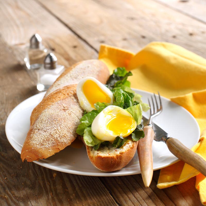 Soft-Boiled Egg Sandwich with Green Salad and Mayonnaise Stock Photo ...