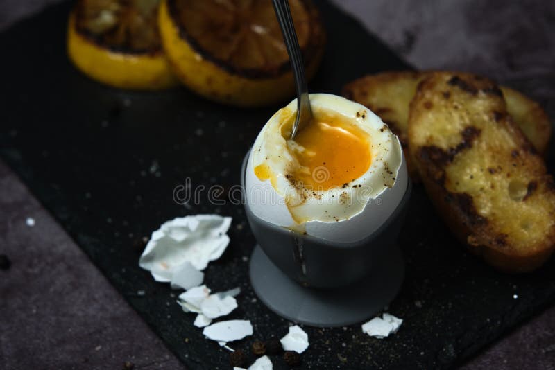 Soft-boiled egg on a stand stock photo. Image of boiled - 219530166