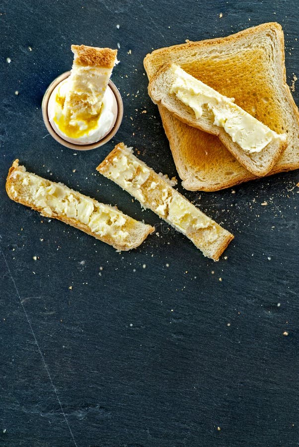 Soft Boiled Egg and Toast Bread Slice with Butter Breakfast Concept ...