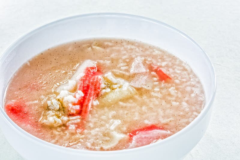 Soft-boiled Rice with Fish and Imitation Crabmeat Stock Image - Image ...