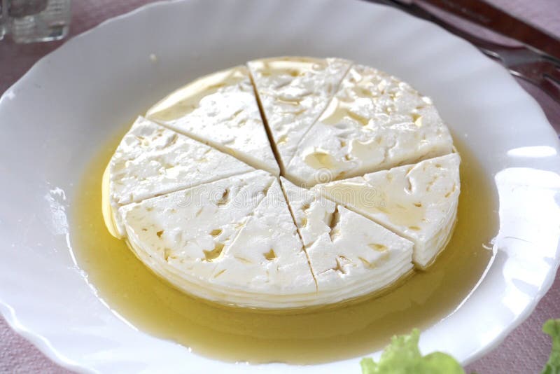 Soft cheese with olive oil stock photo. Image of olive - 76143332