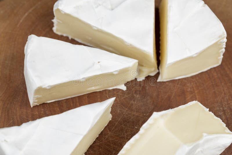 Soft Cheese with White Mold on the Board Stock Photo - Image of ...
