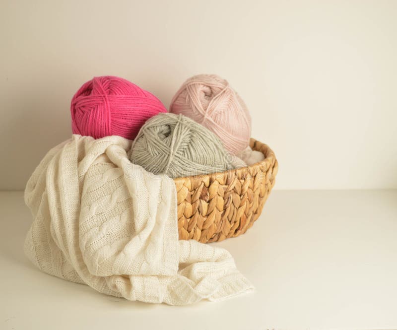 Soft Colored Woolen Balls in Basket with White Woolen Blanket Stock ...