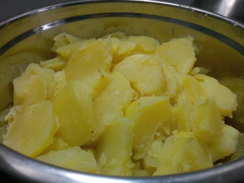 Soft Cooked Potatoes Chopped Up Stock Photo - Image of chopped, silver ...