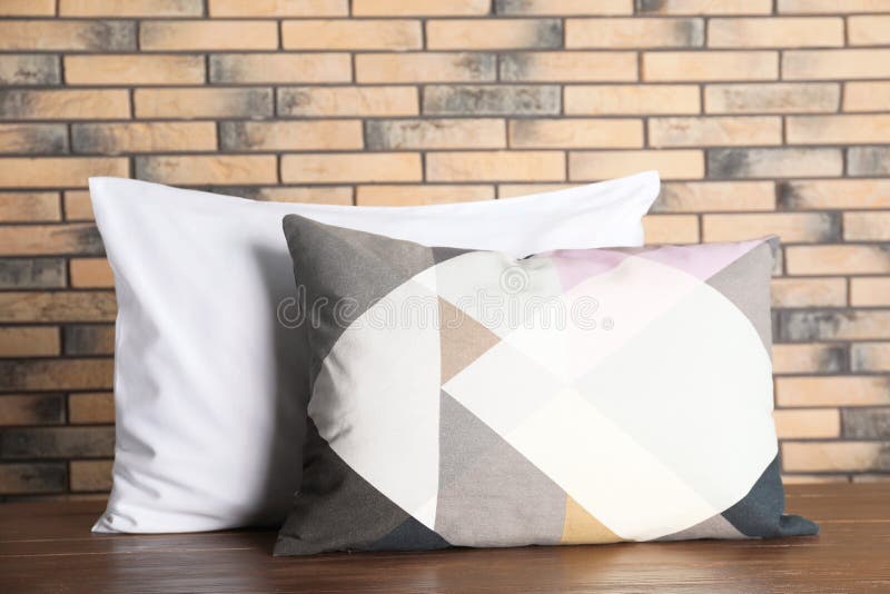 Soft Decorative Pillows on Table Stock Image - Image of pillows ...