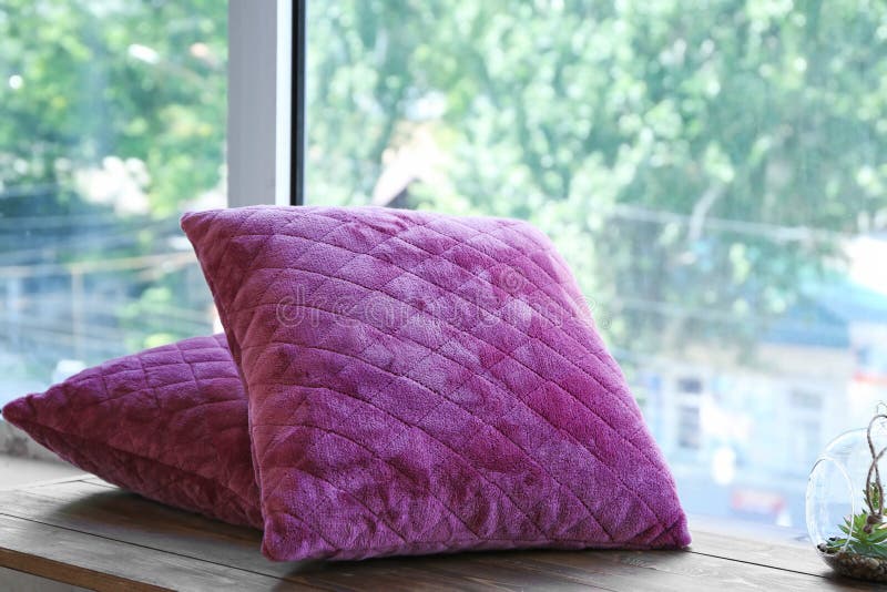 Soft Decorative Pillows on Windowsill Stock Photo - Image of object ...
