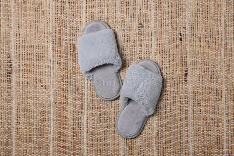 Soft Fluffy Grey Slippers on Carpet, Top View Stock Image - Image of ...
