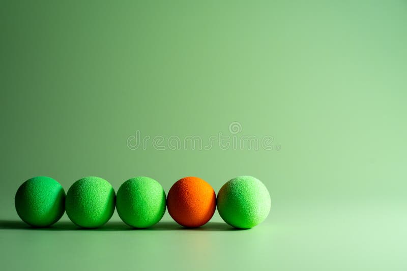 Soft Foam Balls Over a Green Background,team Concept,Communication ...