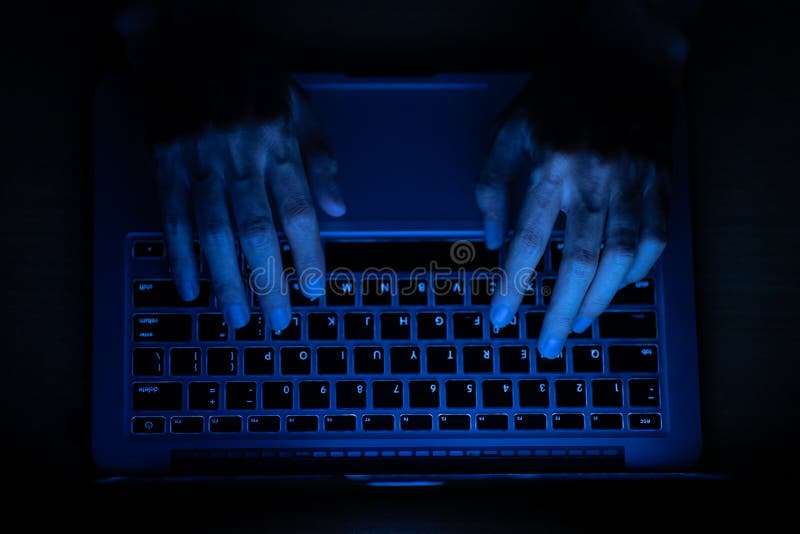 Hands of a Man Using Laptop Computer for Hacking or Steal Data ...