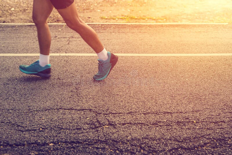 Soft Focus Man Running on the Road at Sunset Stock Image - Image of ...