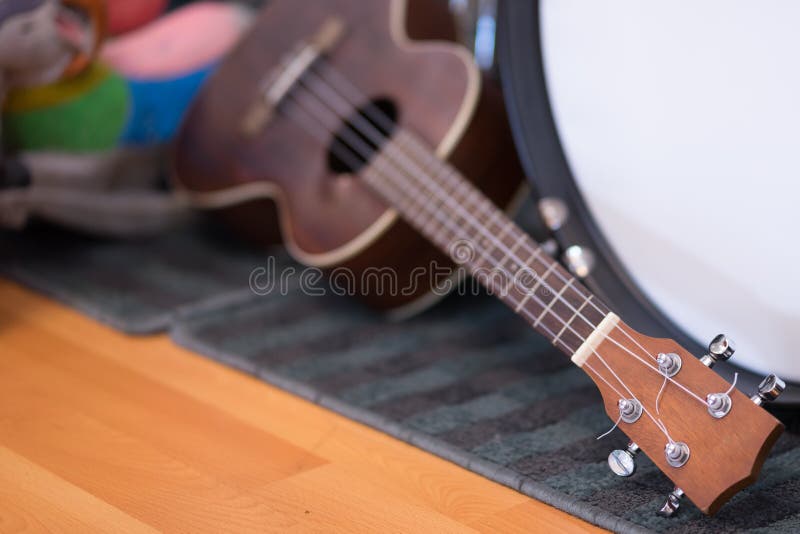 Soft Focus Ukulele on Floor in the Music Room Stock Photo - Image of ...