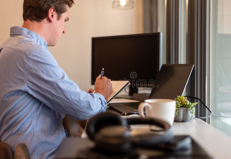 Soft Focus Young Professional Taking Notes while Working Stock Image ...