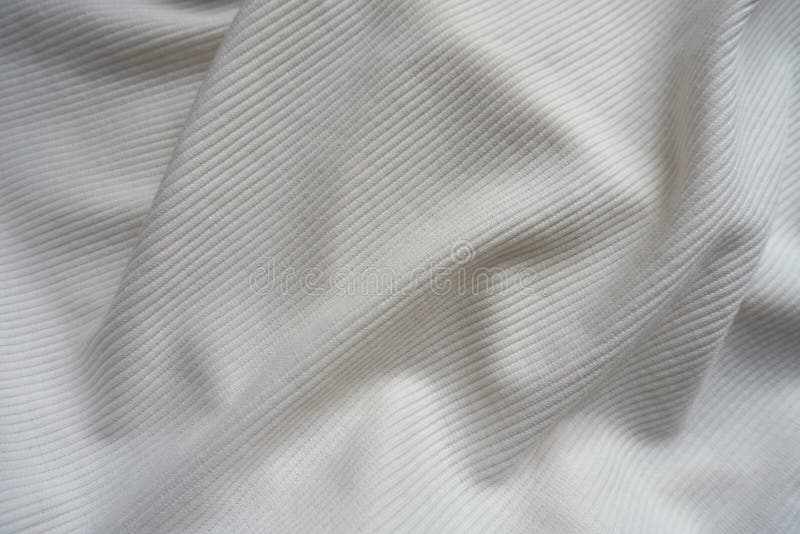 Soft Folds on White Cotton and Polyester Ribbed Fabric Stock Photo ...